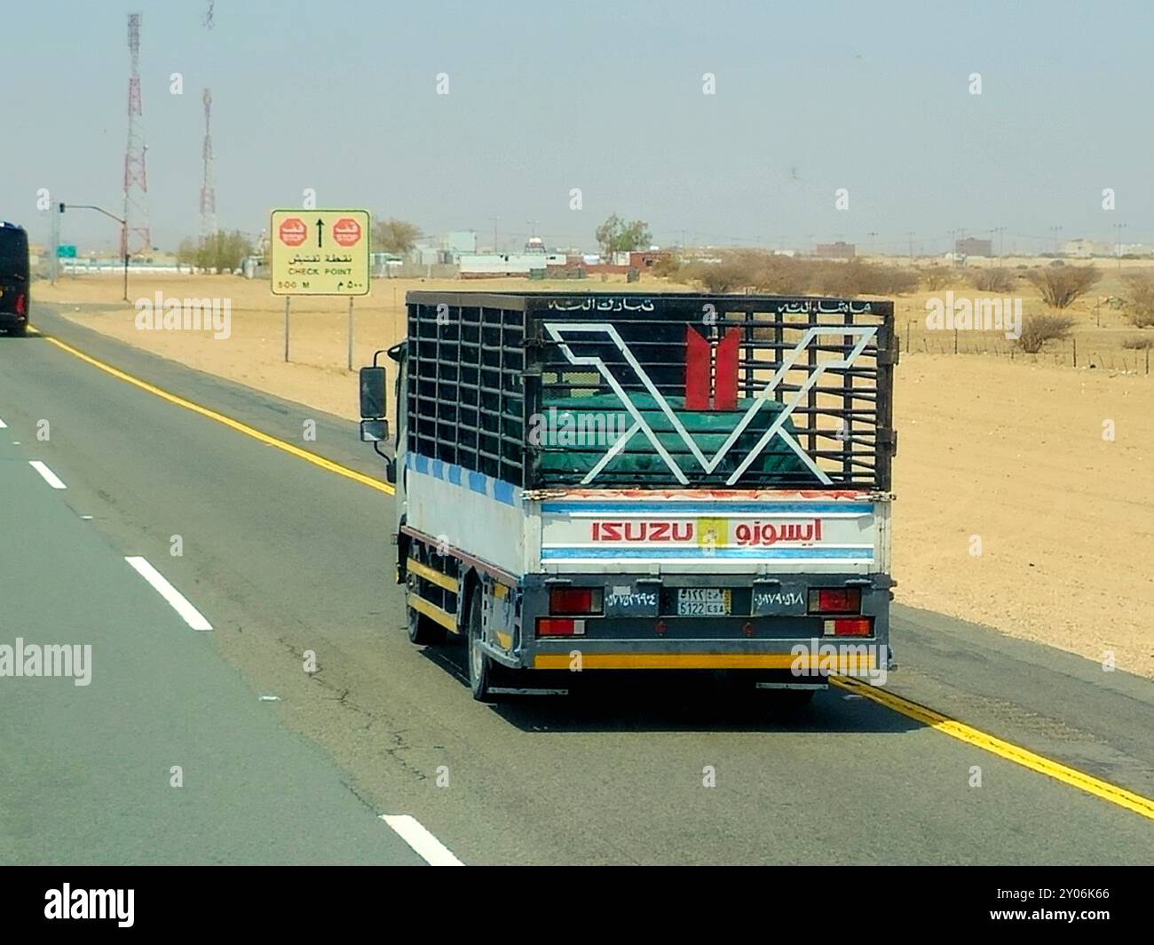 Makkah Madinah road, Saudi Arabia, June 25 2024: Isuzu transportation ...