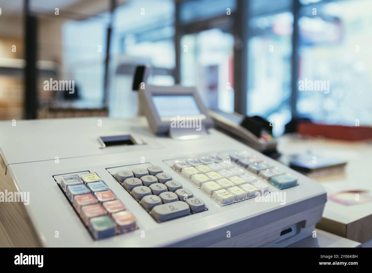 Cash register in a shop: Customer is paying purchase Stock Photo - Alamy