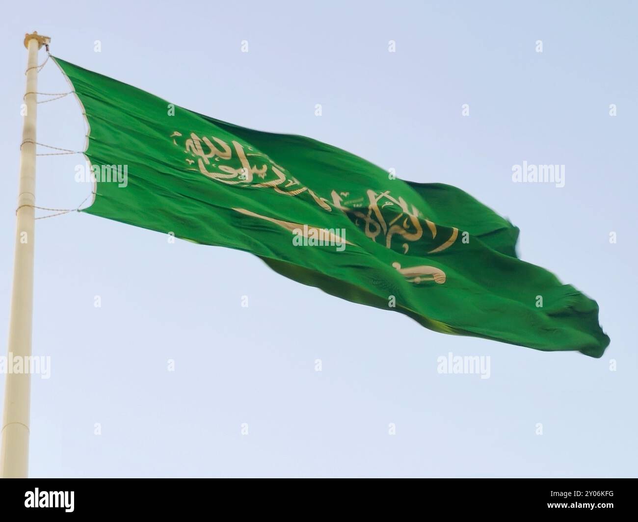 The national flag of Saudi Arabia kingdom, a green background with ...