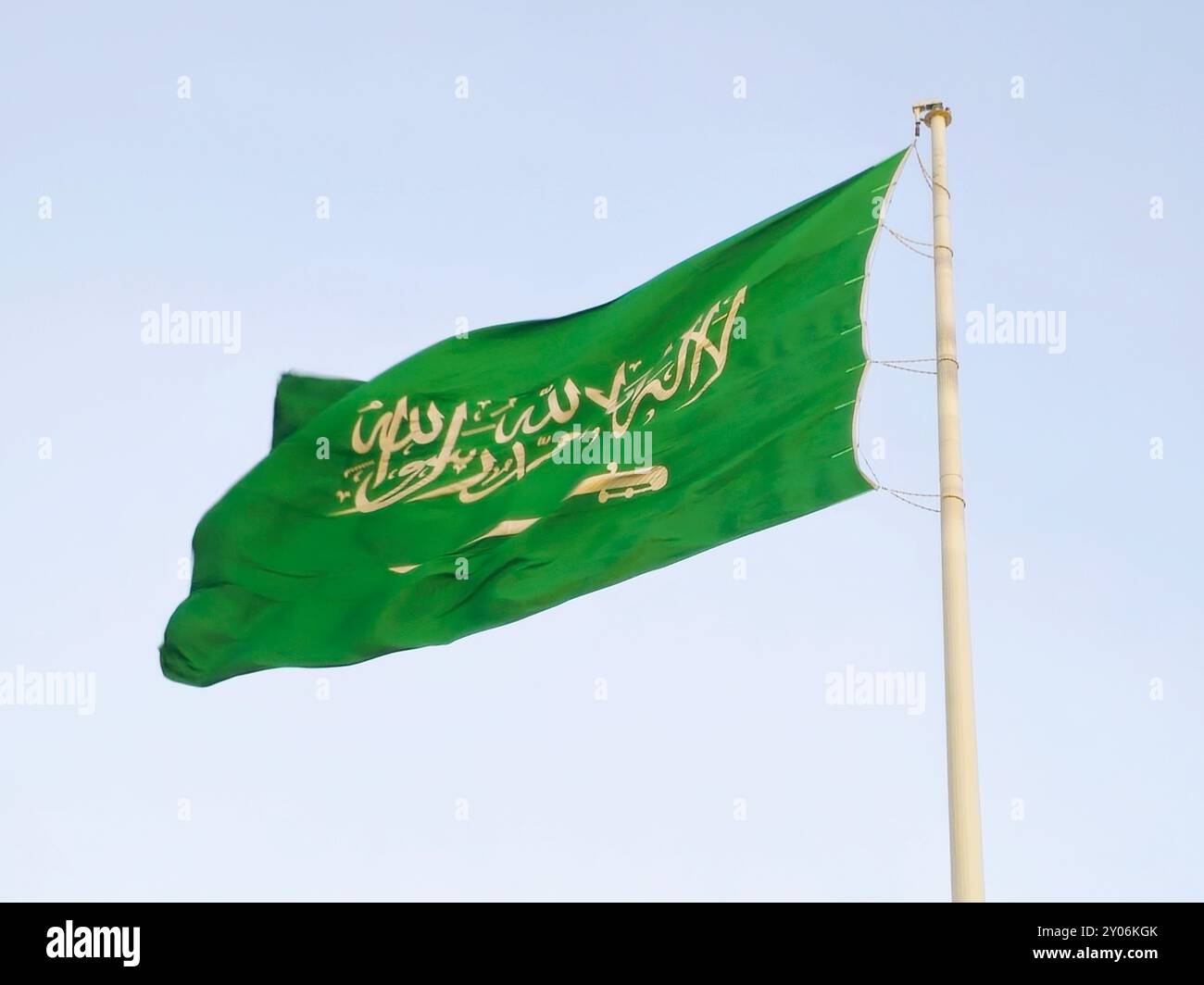 The national flag of Saudi Arabia kingdom, a green background with ...