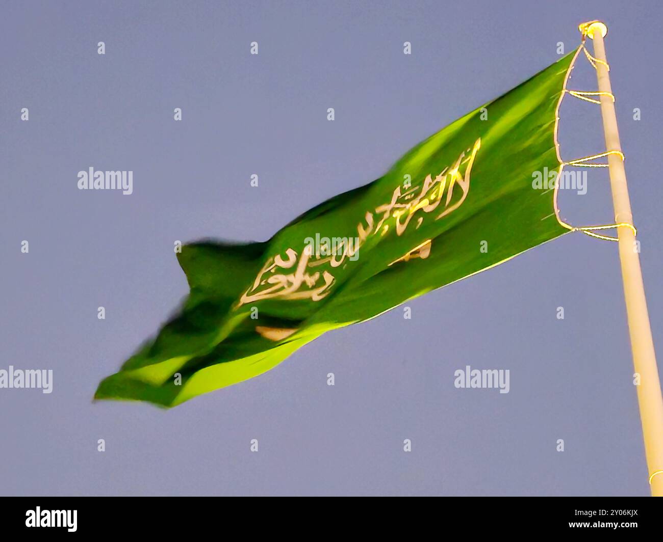 The national flag of Saudi Arabia kingdom, a green background with ...