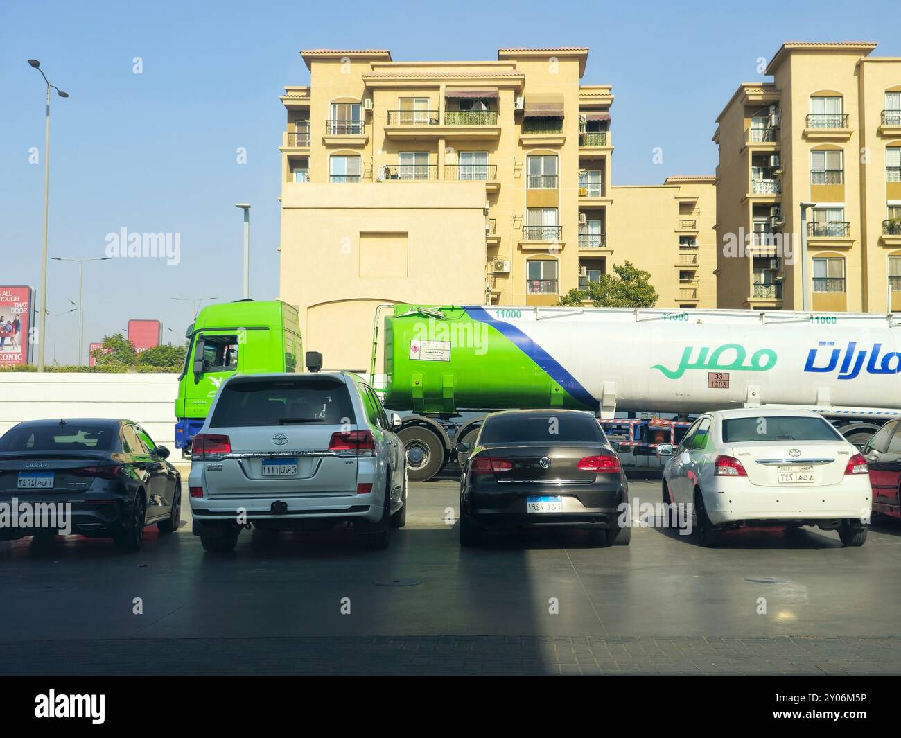 Cairo, Egypt, August 12 2024: Emarat Misr large tanker car ready for refueling the petrol ...