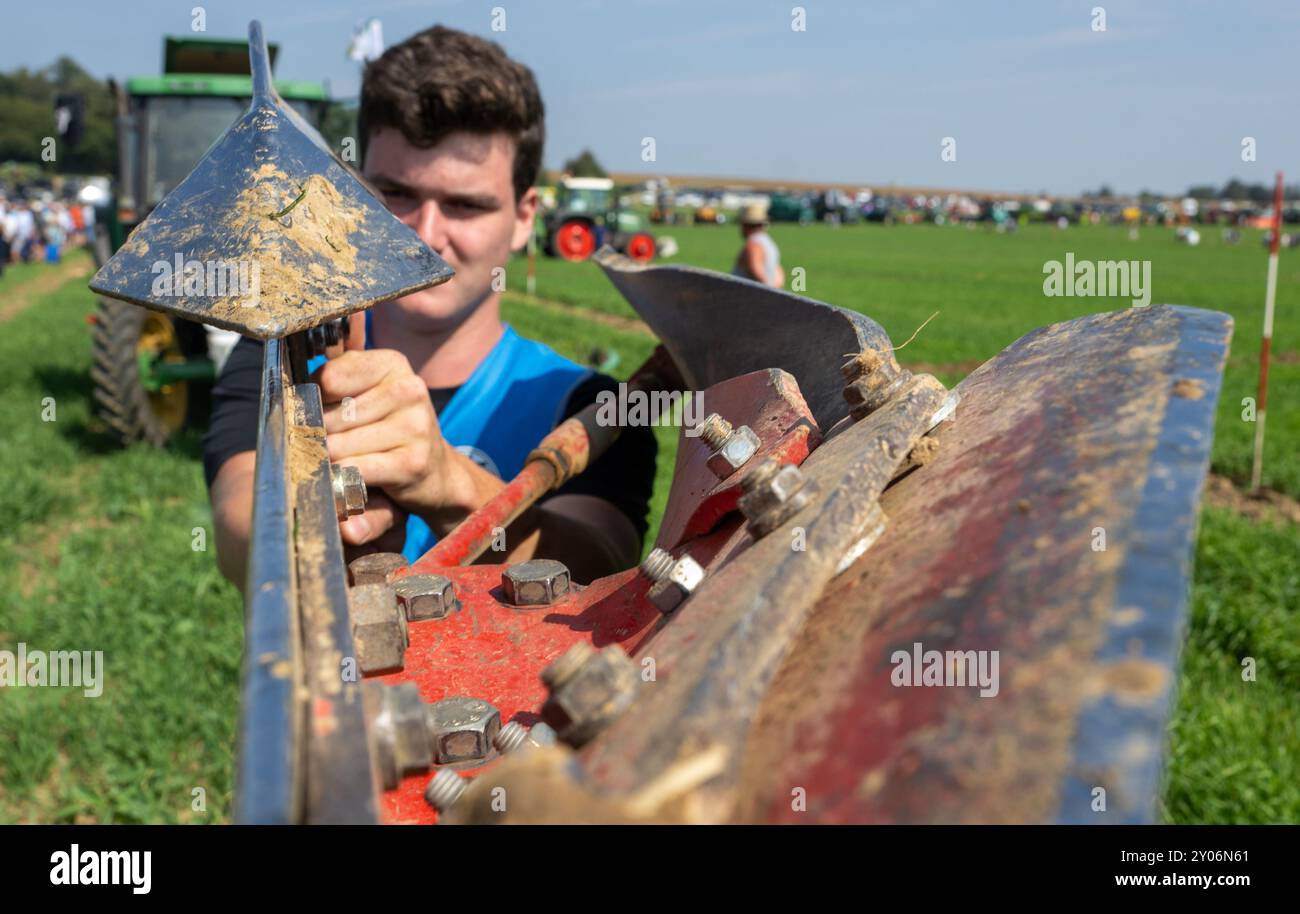 Langenau, Germany. 01st Sep, 2024. Lukas Häkle checks the settings of ...