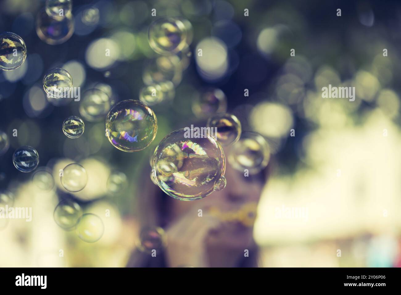 Colorful soap bubbles outdoors, summer time, fun Stock Photo - Alamy