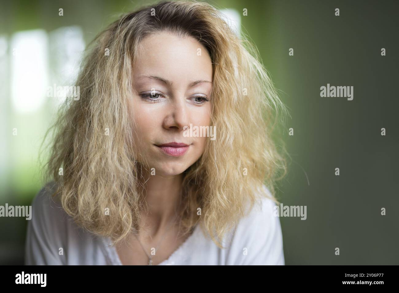 Woman looks downcast in hi-res stock photography and images - Alamy