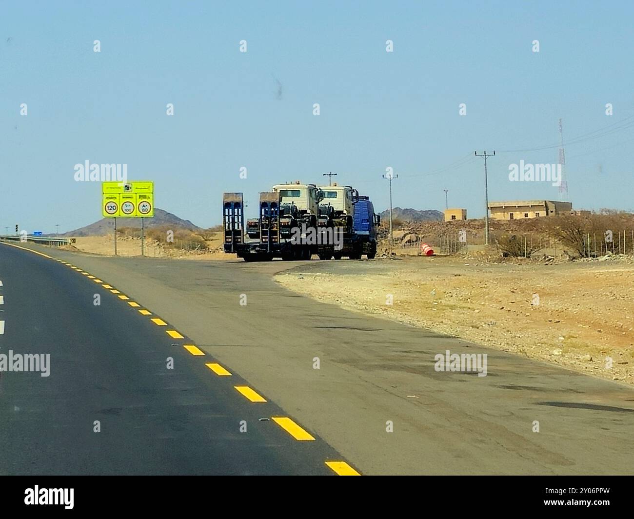 Makkah Madinah road, Saudi Arabia, June 25 2024: A big flatbed truck ...