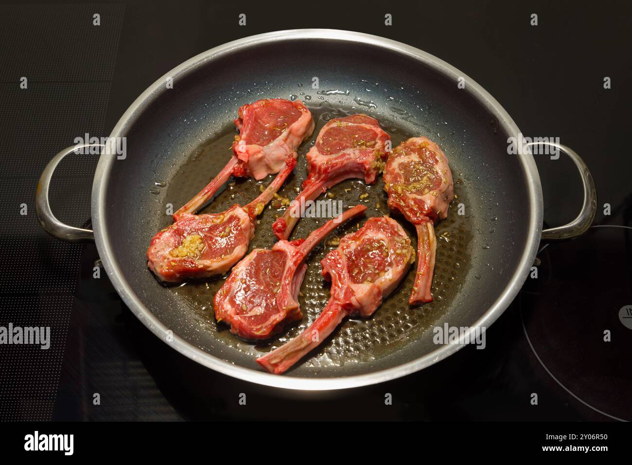 Rack of lamb are pan fried Stock Photo - Alamy