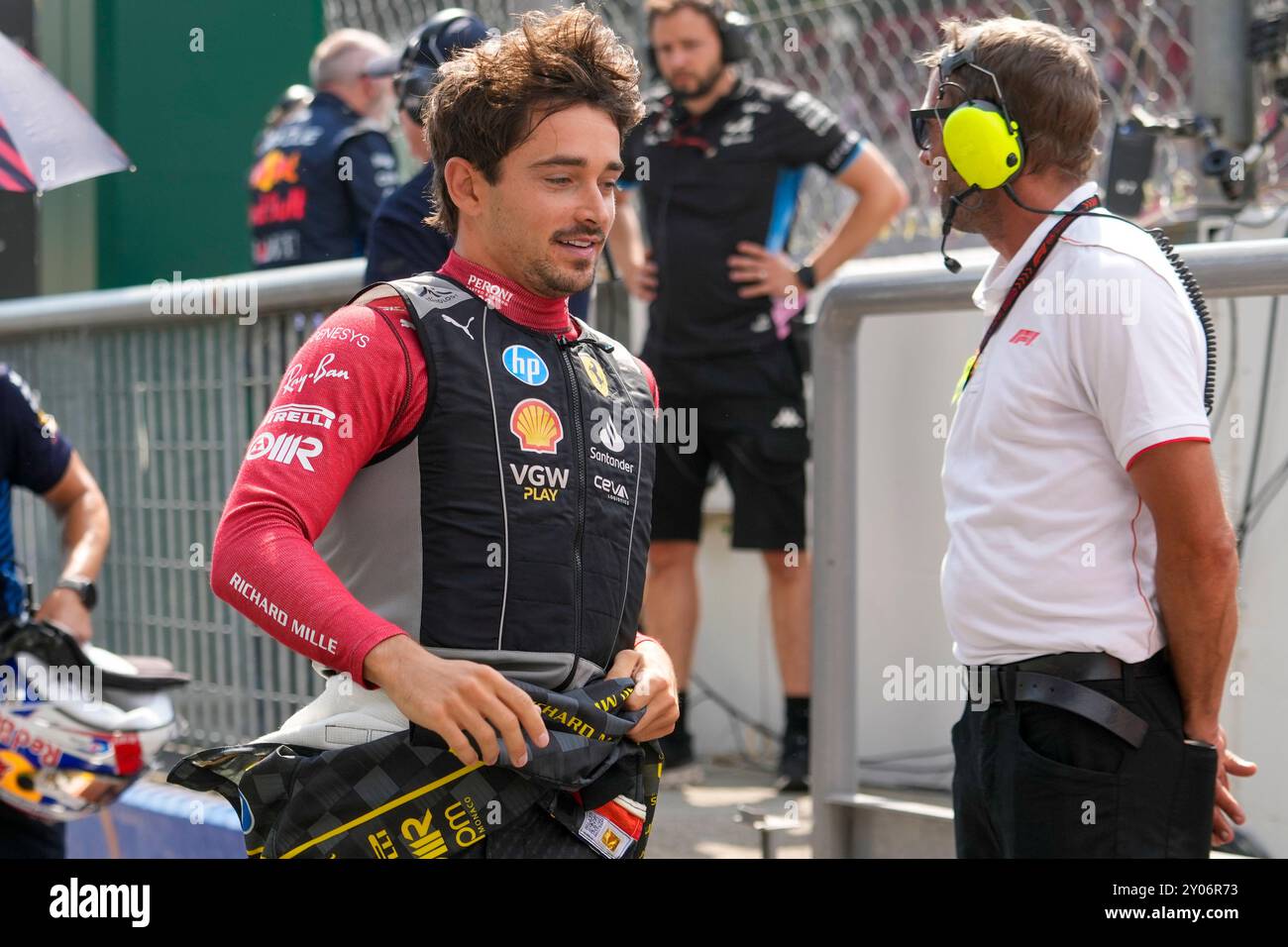 Ferrari driver Charles Leclerc of Monaco is on his way to the starting ...