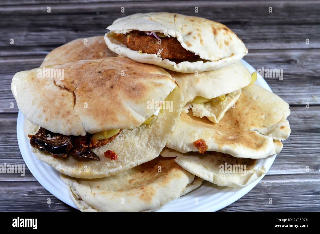 Traditional Egyptian popular breakfast street sandwiches of mashed fava ...