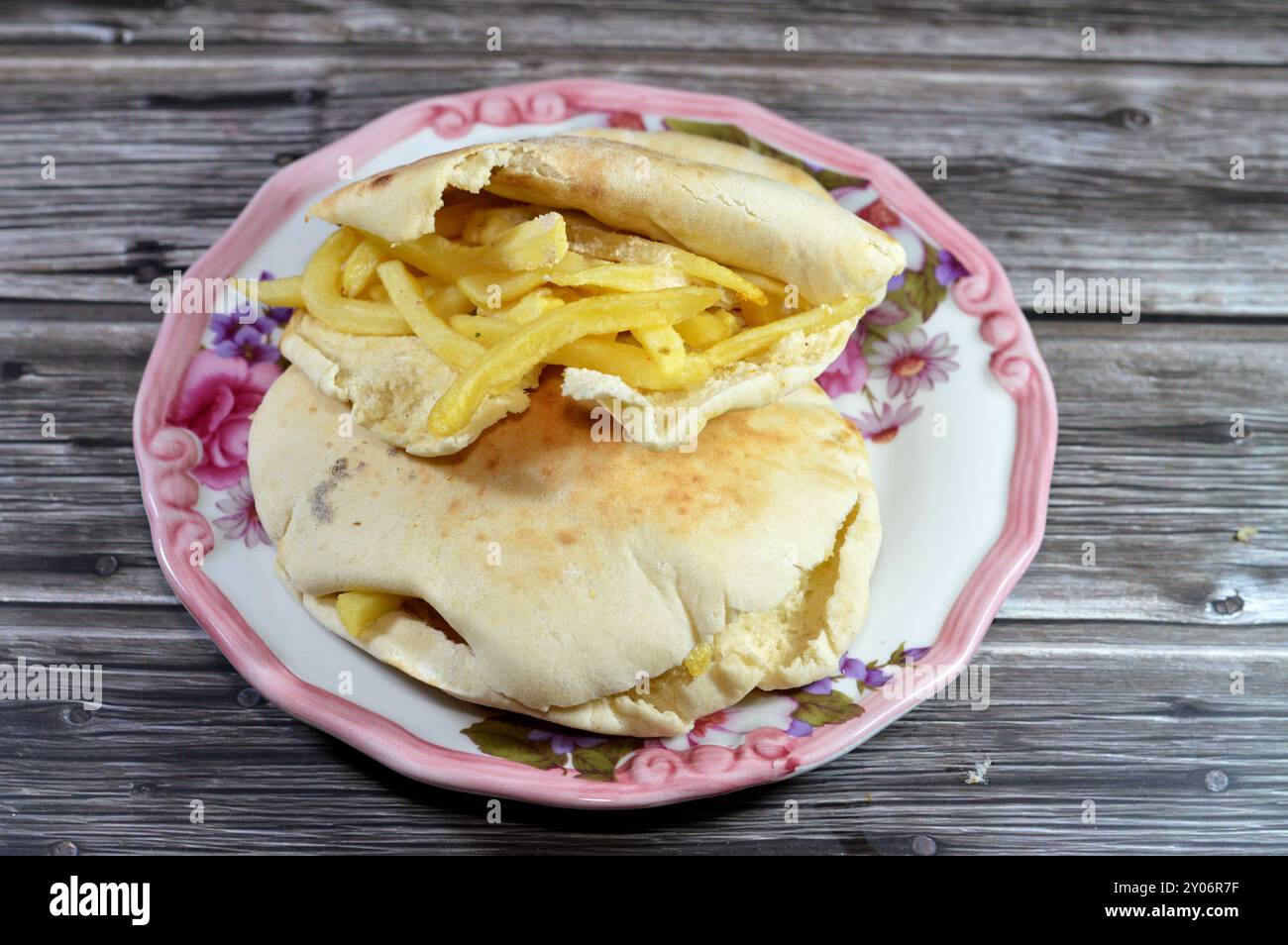 Potatoes with Tahini in Flat Shami Syrian bread filled with French ...