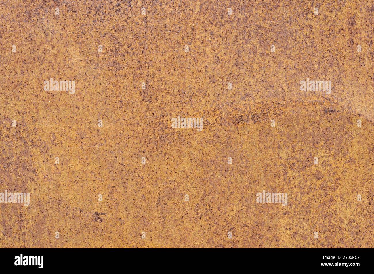 Rusty yellow-red textured metal surface. The texture of the metal sheet ...