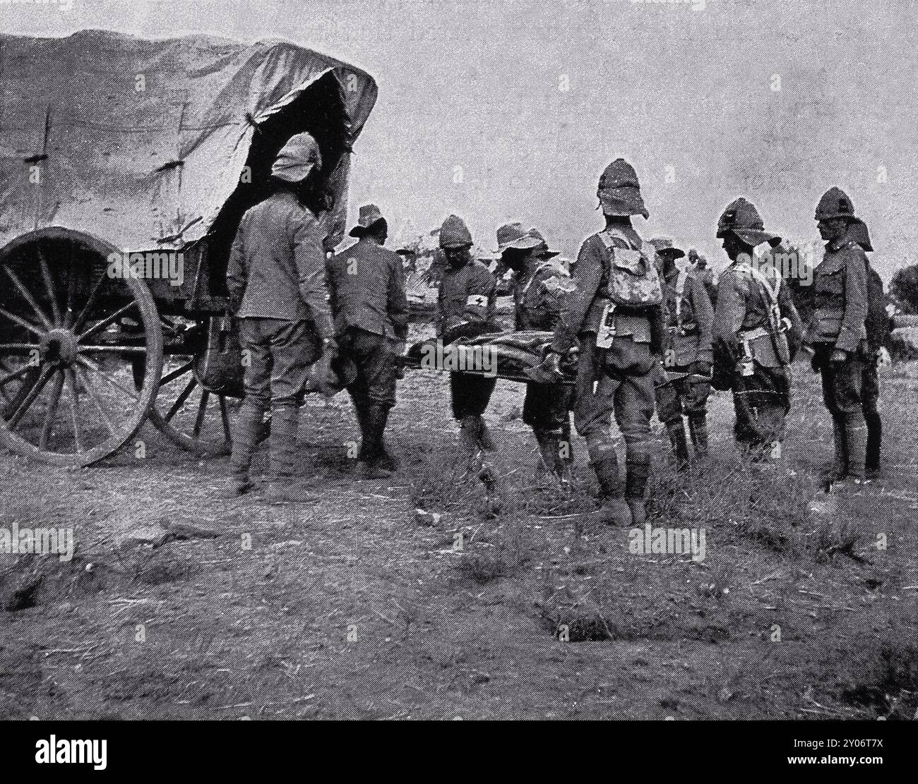 Troops methodically remove the bodies of fallen soldiers from the ...