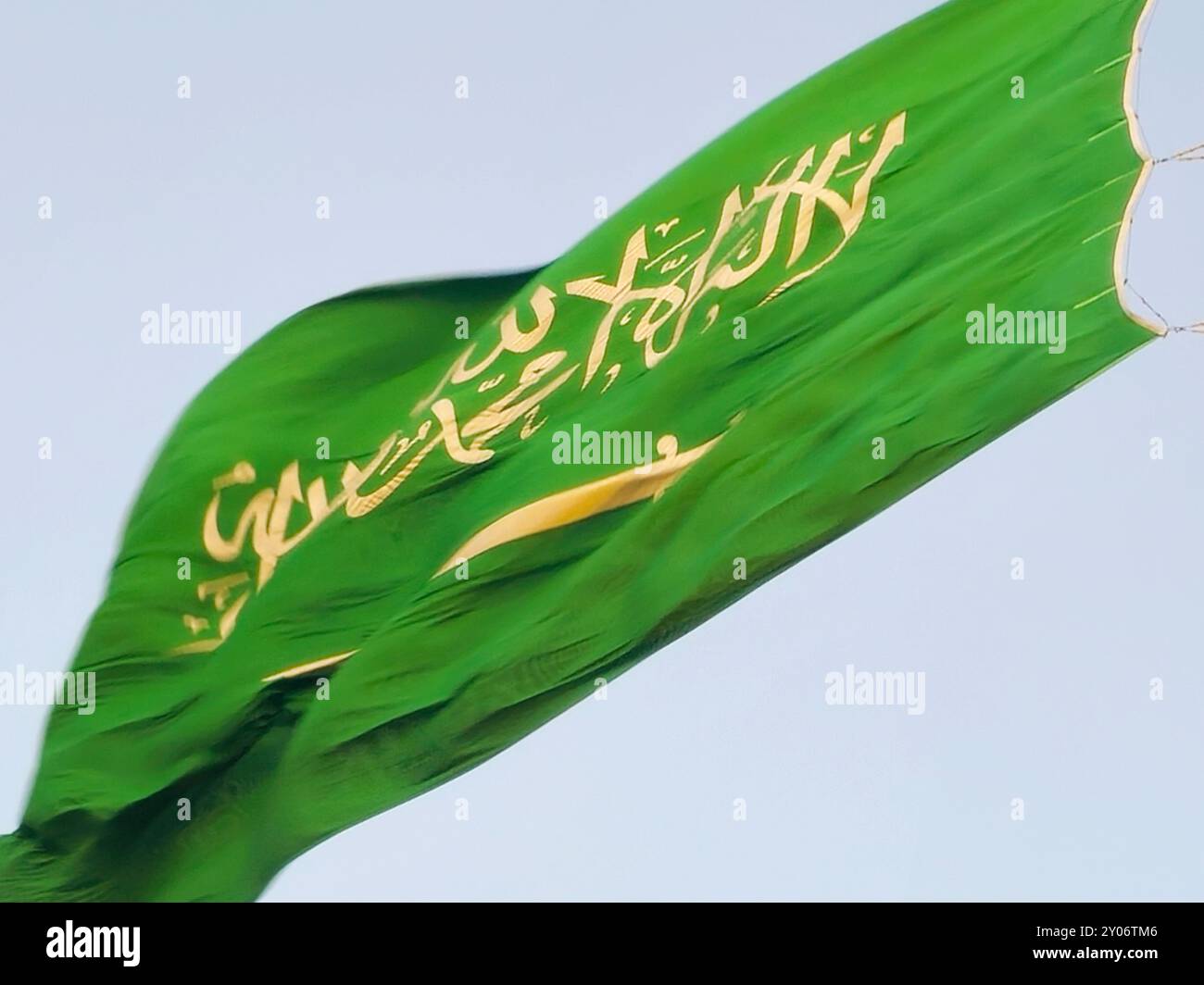 The national flag of Saudi Arabia kingdom, a green background with ...