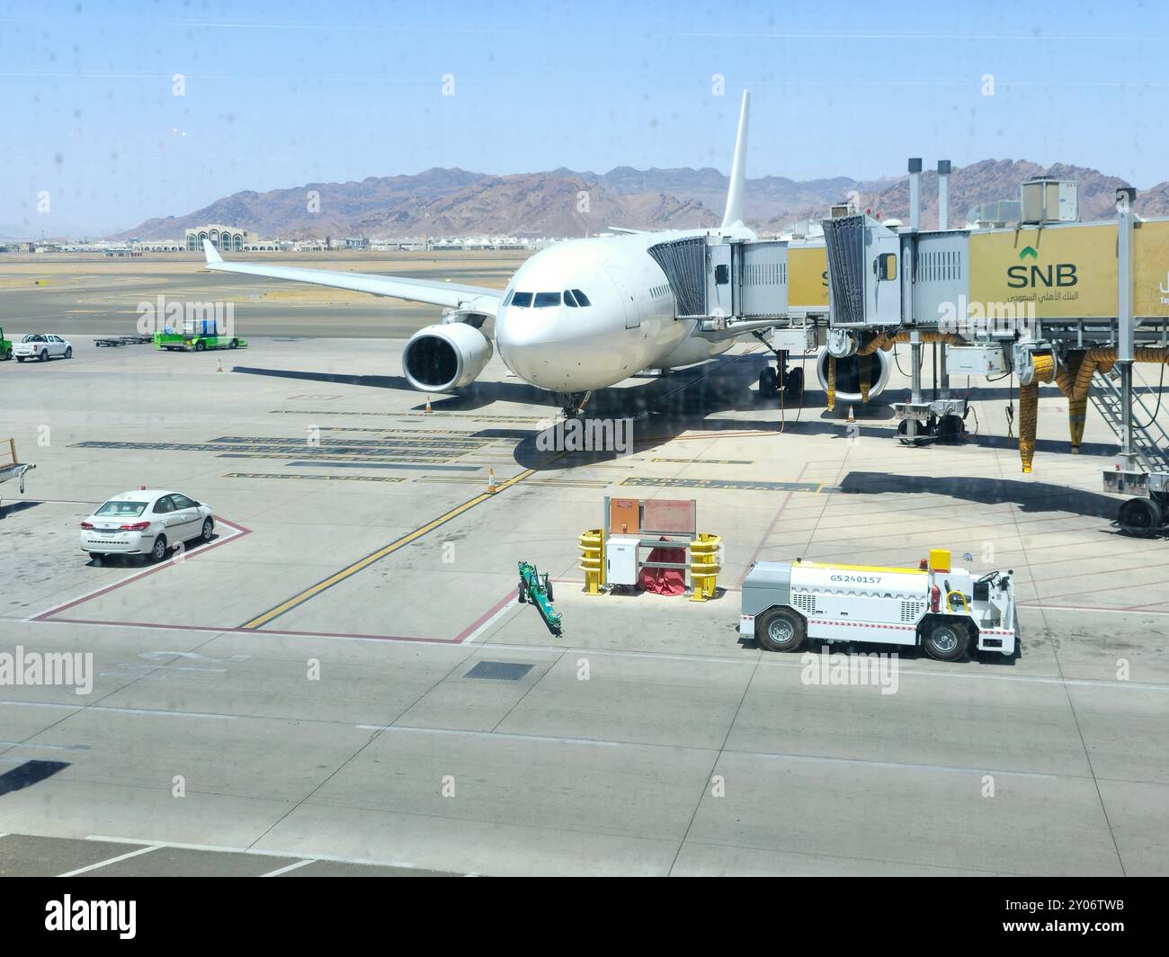 Medina, Saudi Arabia, June 29 2024: a plane in Prince Mohammad Bin AbdulAziz International ...