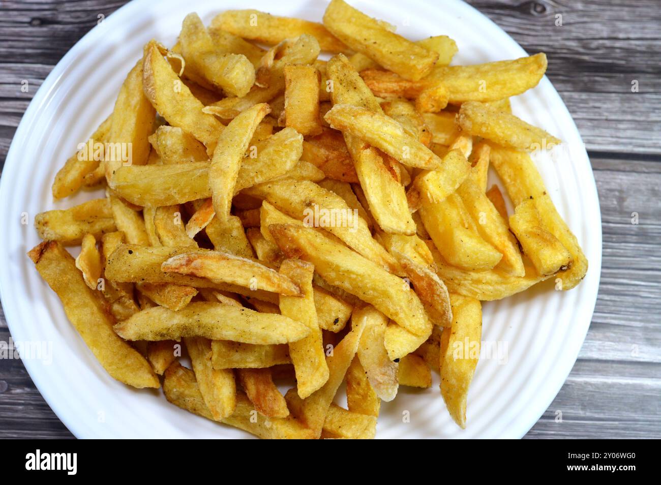 French fries, chips, finger chips, french-fried potatoes, or simply ...