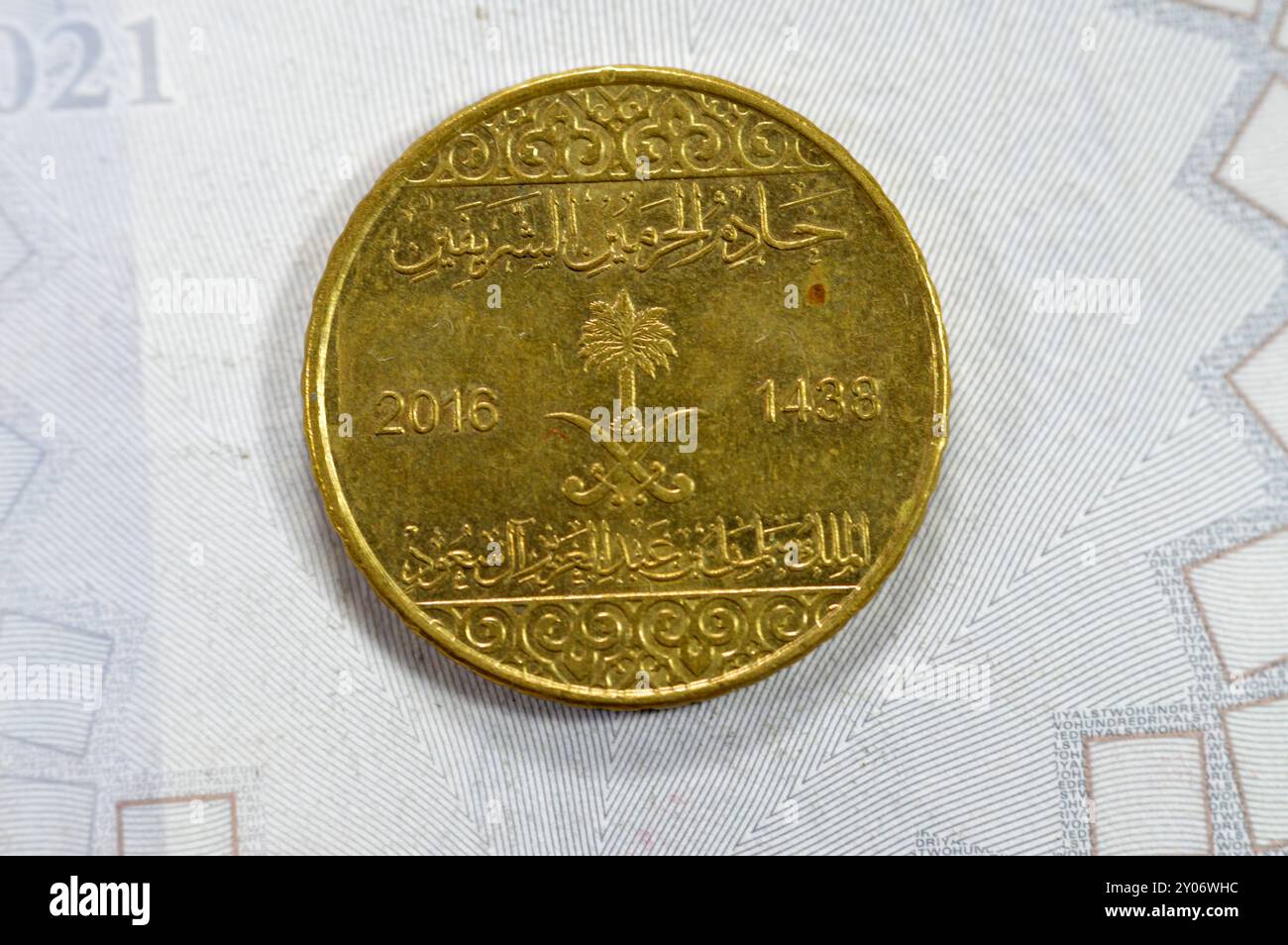 A quarter of SAR Saudi Arabian riyal coin 25 Halalas, features Coat Of ...