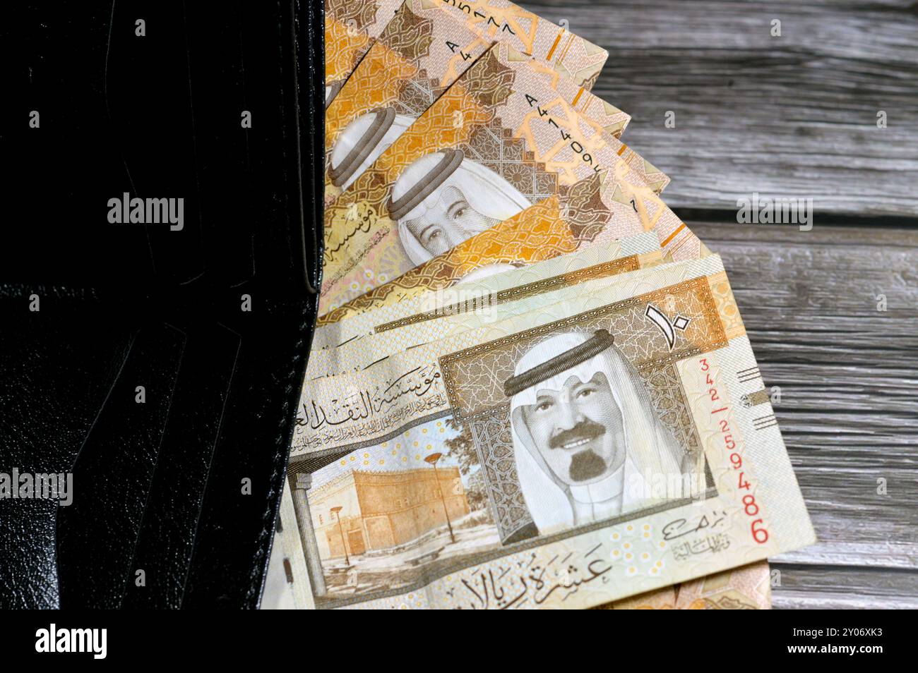 Saudi Arabian Riyals bills banknotes, pile of SAR riyal cash money ...