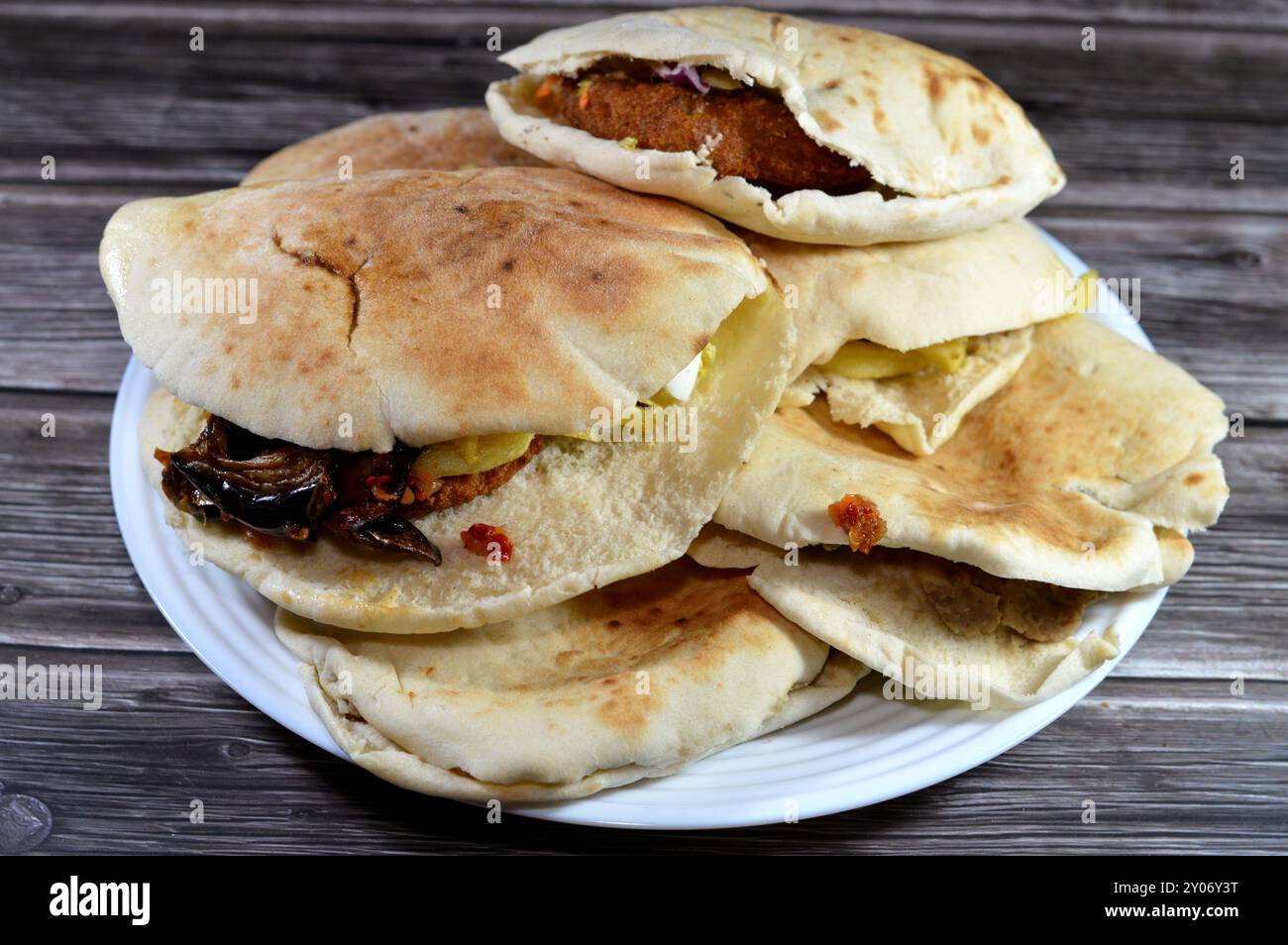 Traditional Egyptian popular breakfast street sandwiches of mashed fava ...