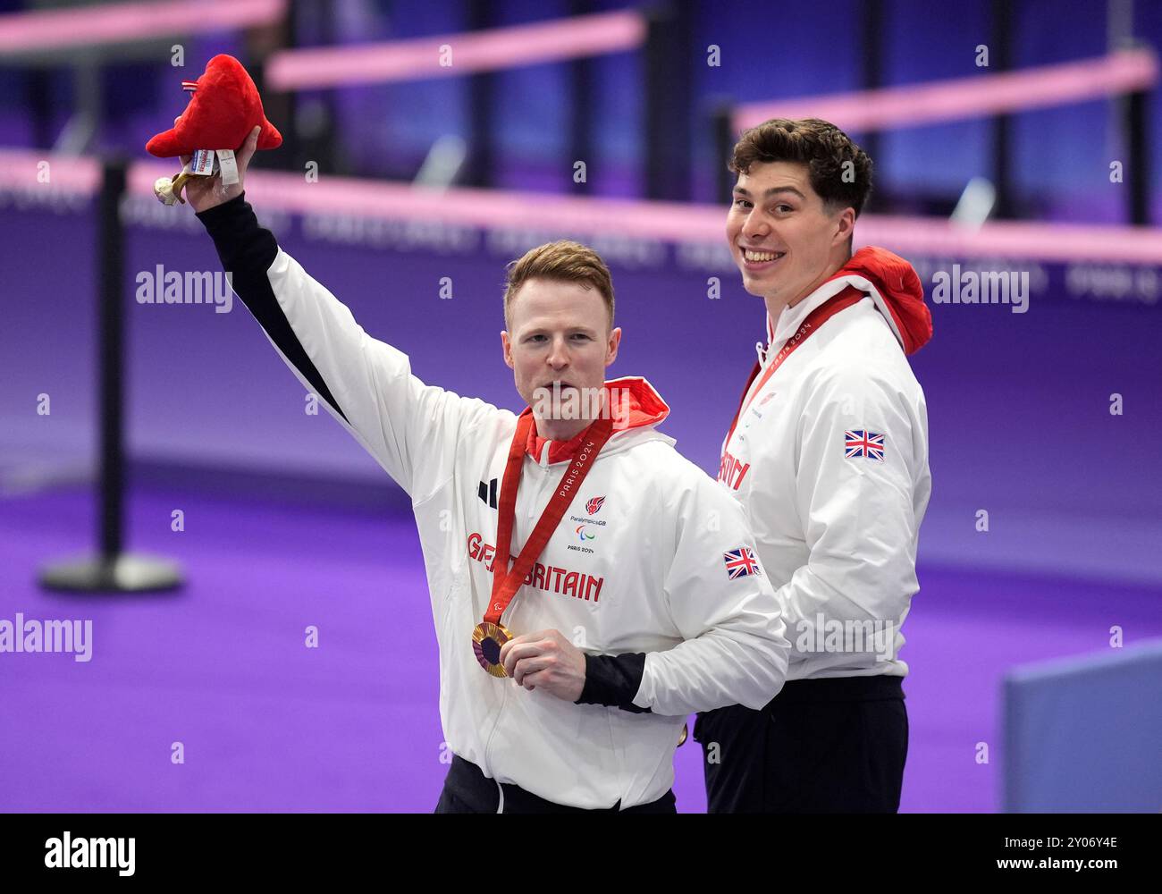 Great Britain's James Ball and pilot Steffan Lloyd on the podium with ...
