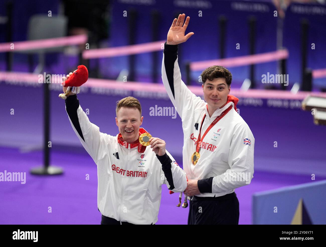 Great Britain's James Ball and pilot Steffan Lloyd on the podium with ...
