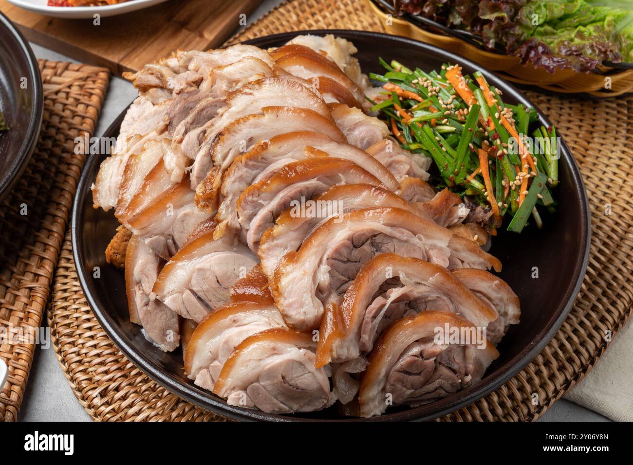 Korean food, pig's feet, pork, bossam, lettuce, perilla leaves, spicy ...