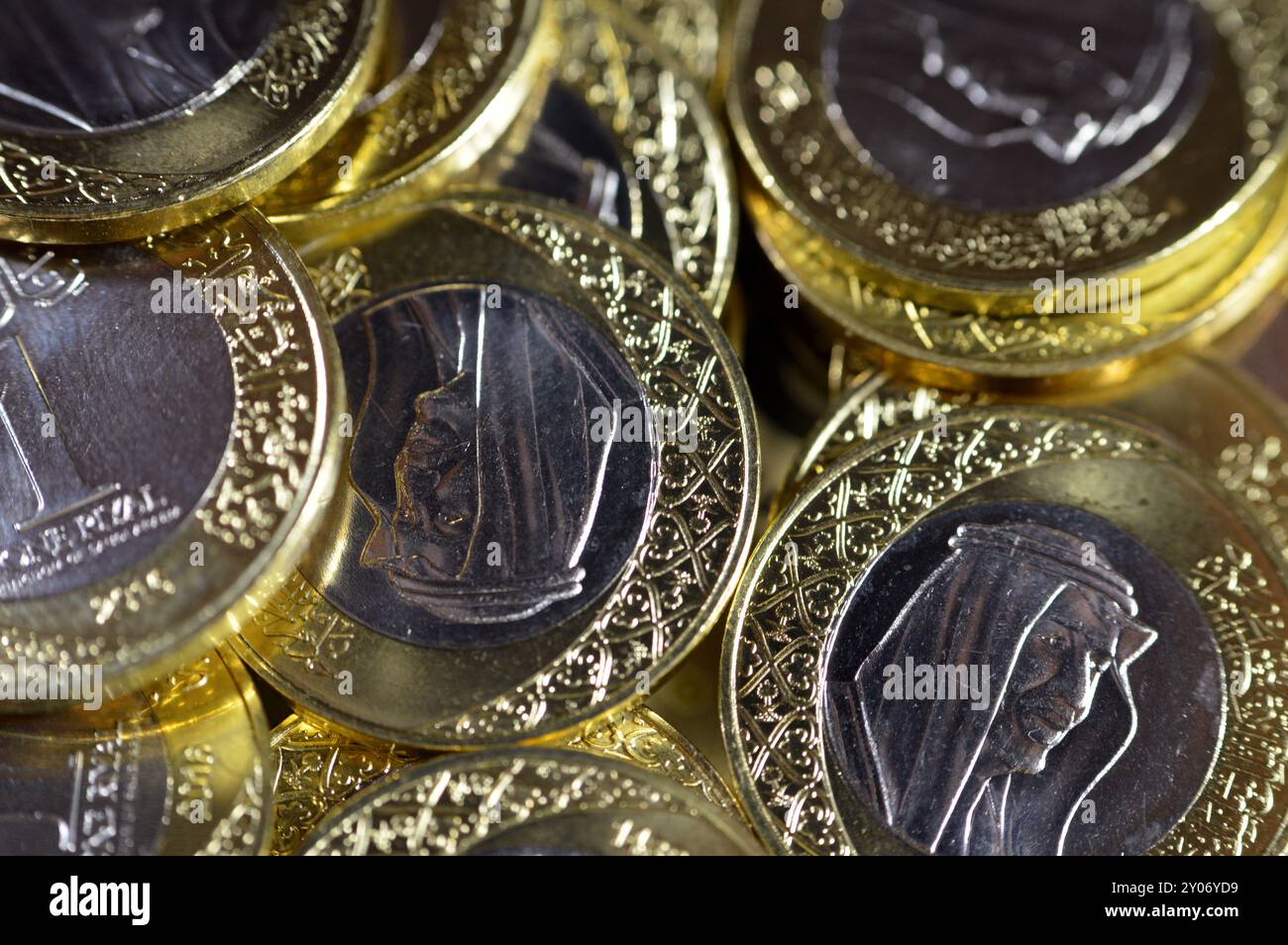 Stacks of 1 One Saudi Arabian Riyal coin currency features King Salman ...