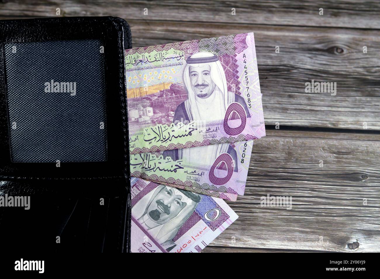 Saudi Arabian Riyals bills banknotes, pile of SAR riyal cash money ...