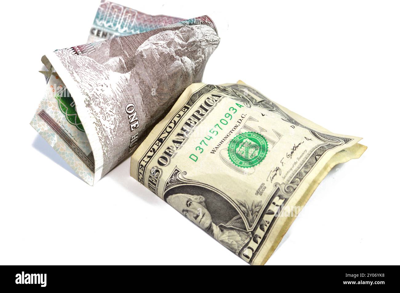 Egyptian EGP LE crumpled pounds and USD American wrinkled dollars bills ...