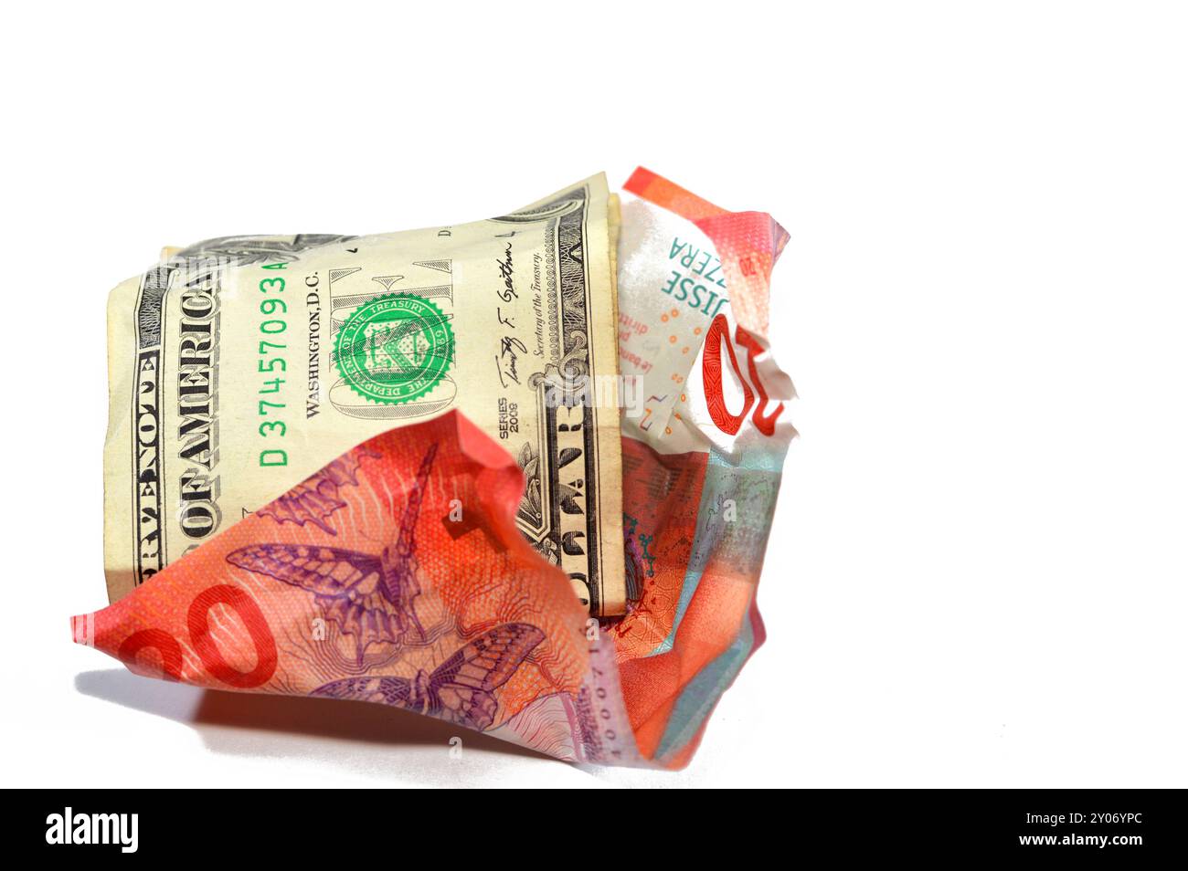 American USD dollar crumpled banknote with Swiss CHF francs wrinkled ...