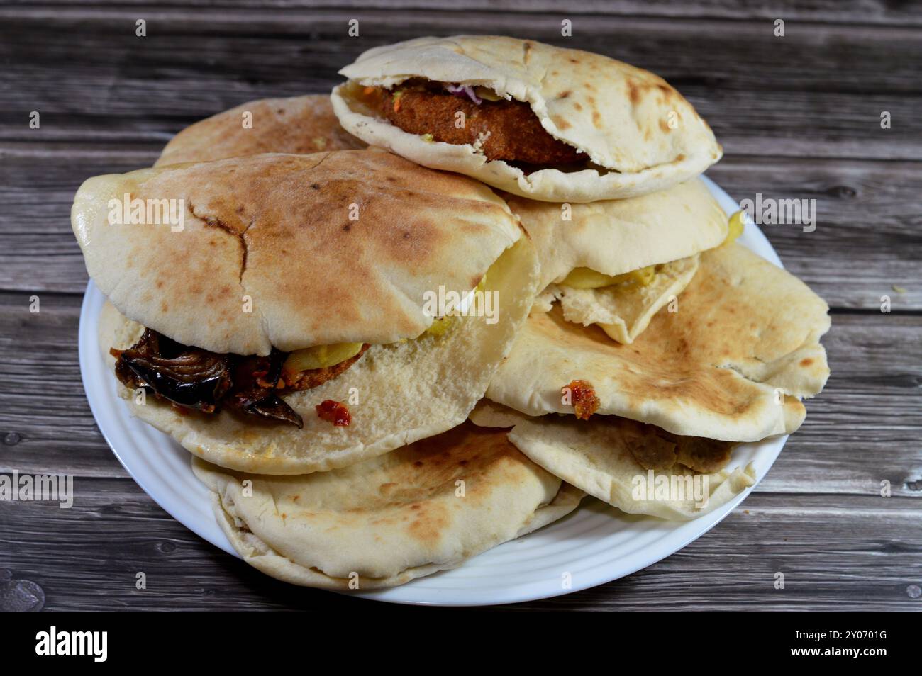 Traditional Egyptian popular breakfast street sandwiches of mashed fava ...