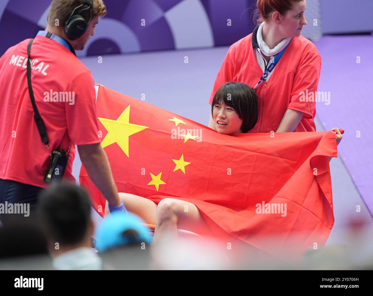 Paris, France. 1st Sep, 2024. Shi Yiting (C) of China reacts after the ...
