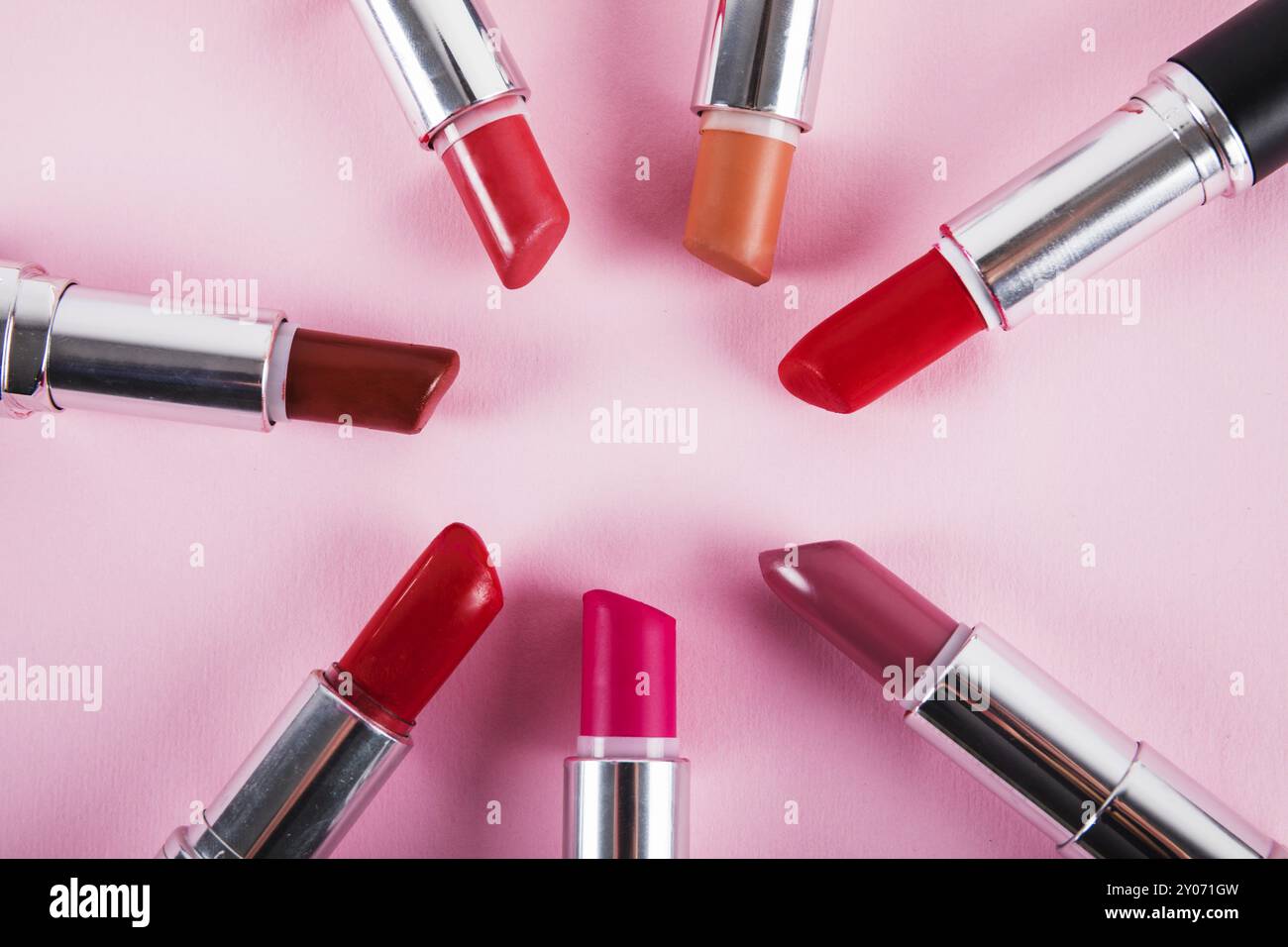 Collection various colorful lipsticks pink surface. Beautiful photo ...