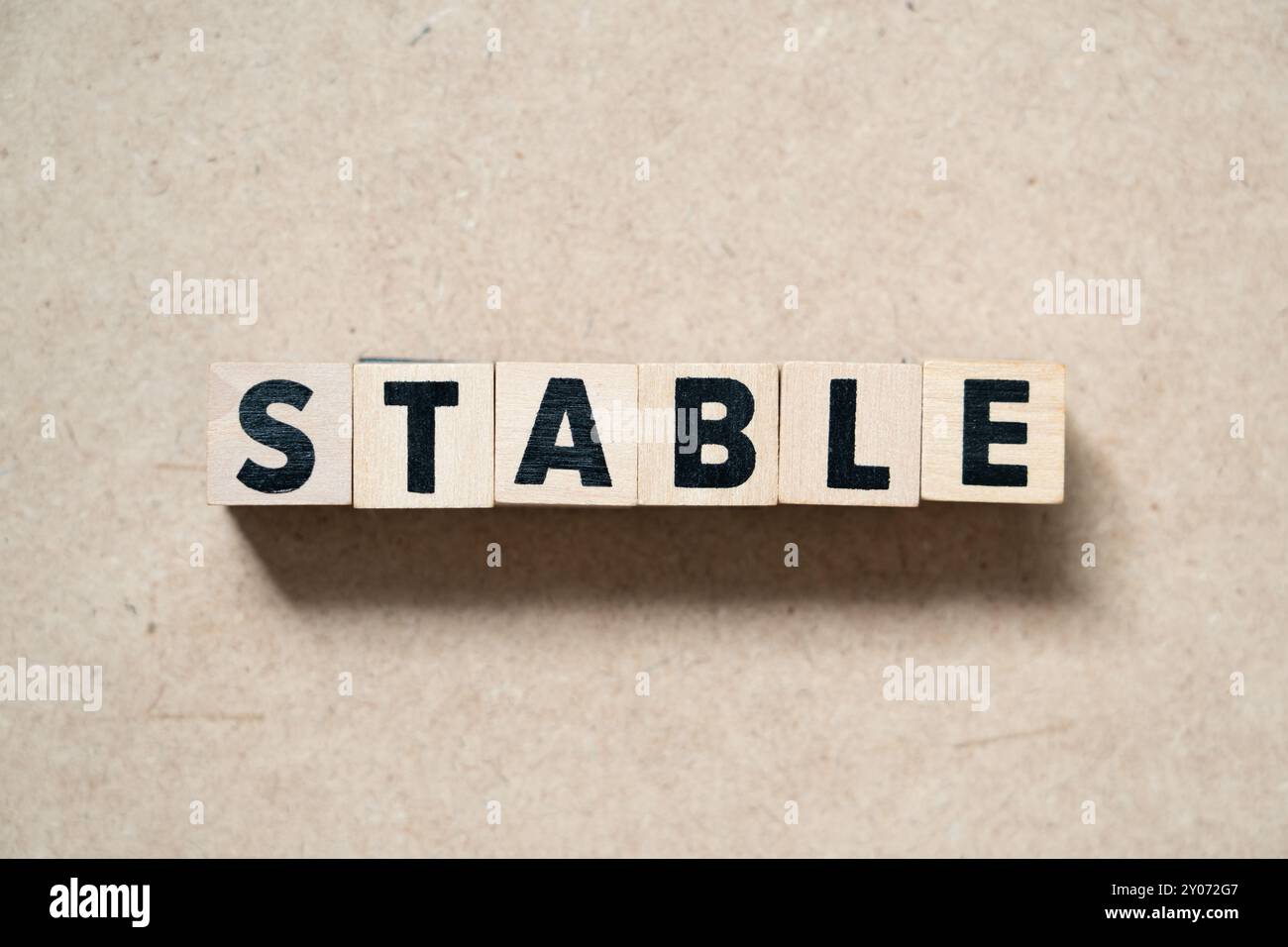 Alphabet letter block in word stable on wood background Stock Photo - Alamy