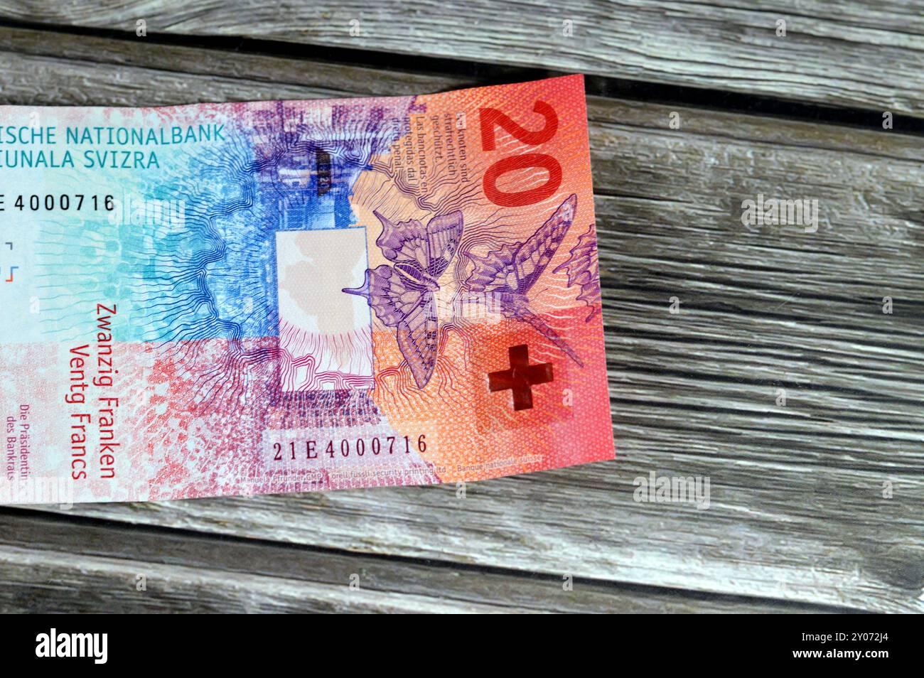 reverse side of Switzerland 20 Twenty Francs, butterflies, a light ...