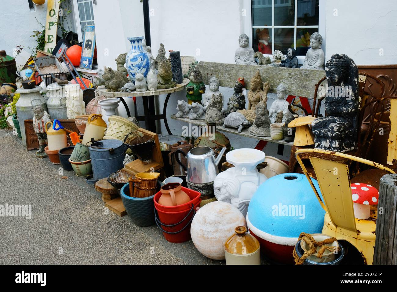 Assorted reclaimed items at a junk shop, Tintagel, Cornwall, UK - John ...