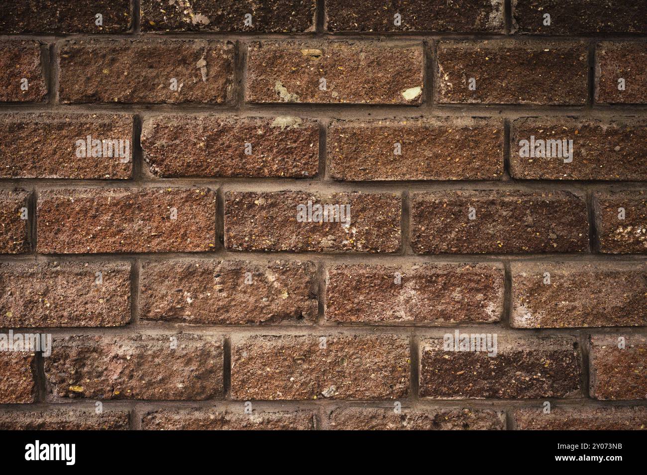 Textured background of antique decorative brick with easy vignetting ...
