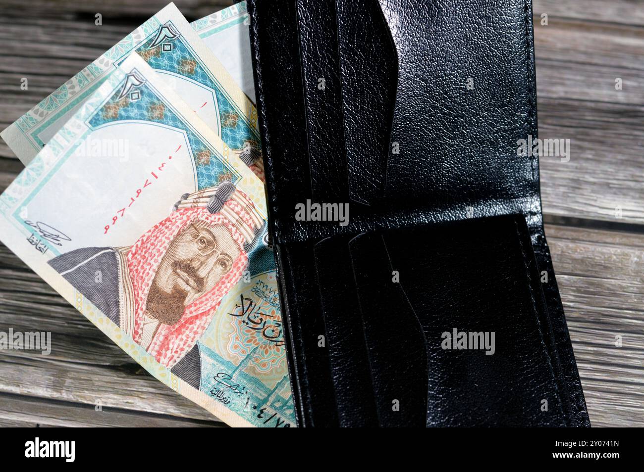 Saudi Arabian Riyals bills banknotes, pile of SAR riyal cash money ...