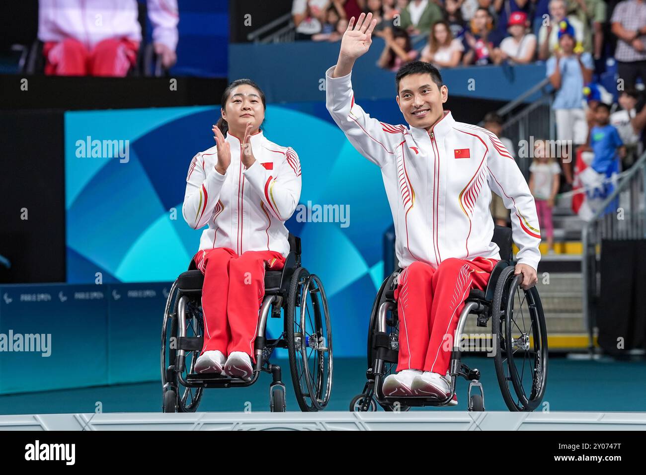 Paris, France. 1st Sep, 2024. Gold medalists Feng Panfeng (R)/Zhou Ying ...