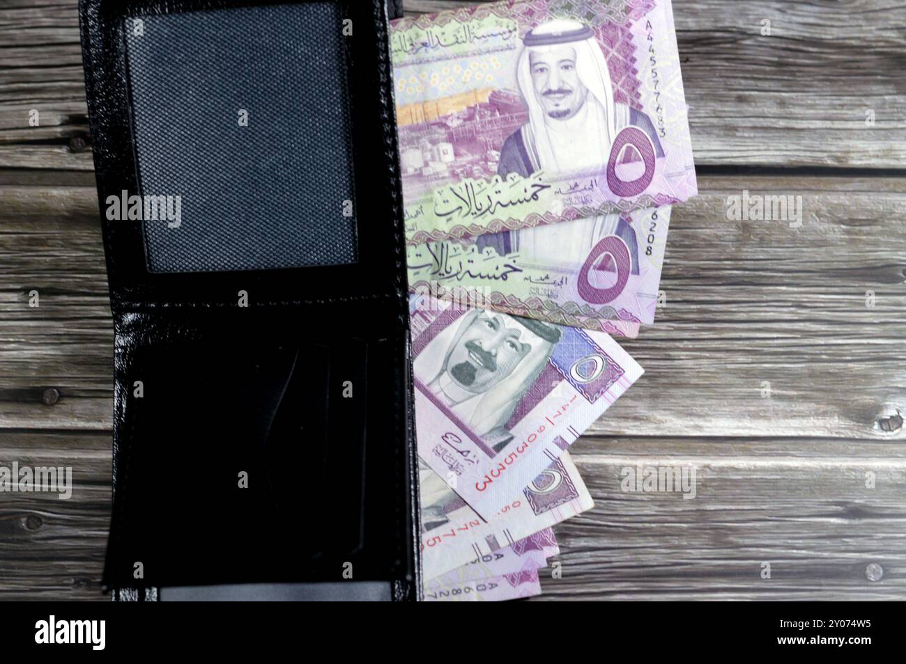 Saudi Arabian Riyals bills banknotes, pile of SAR riyal cash money ...