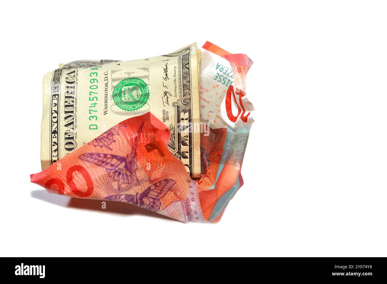 American USD dollar crumpled banknote with Swiss CHF francs wrinkled ...