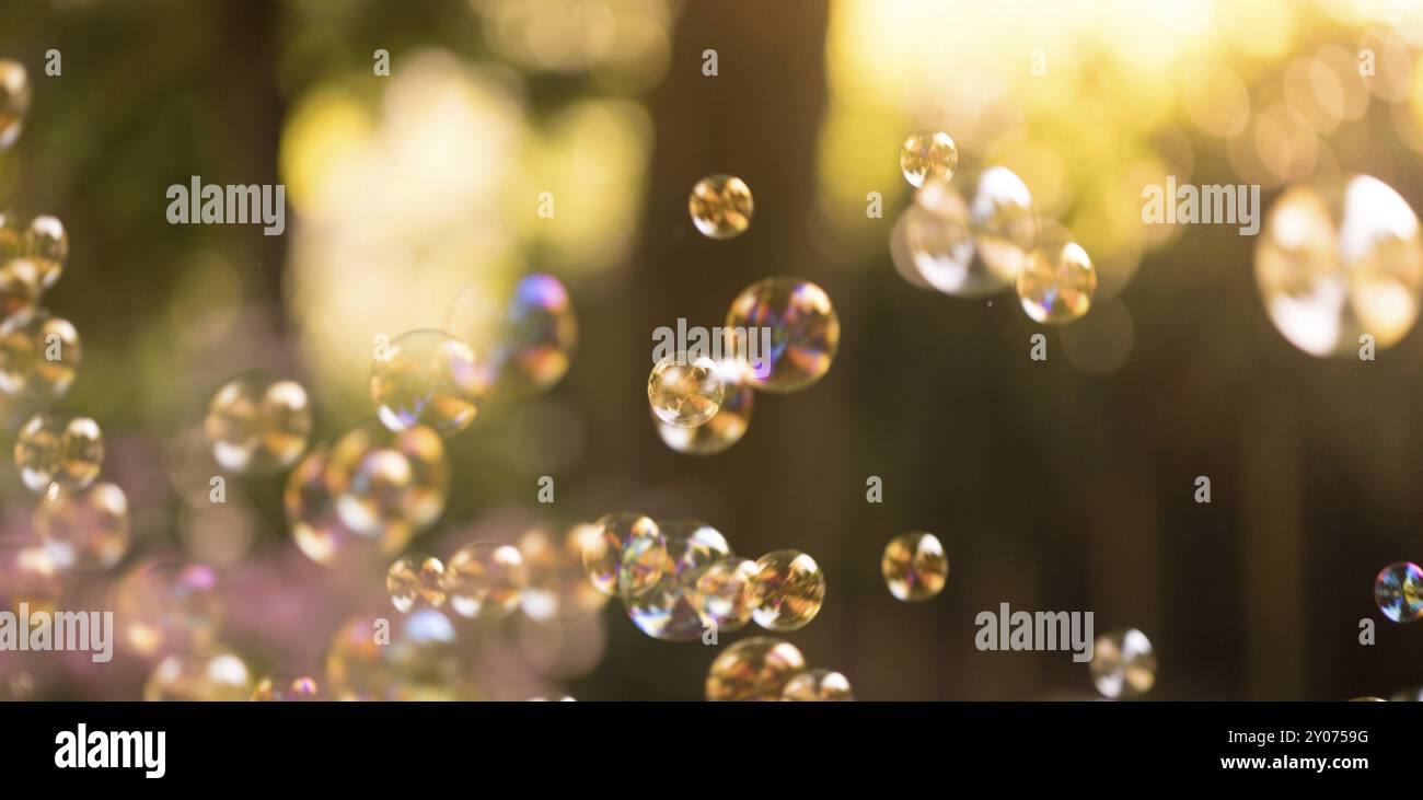 Colorful soap bubbles outdoors, summer time, fun Stock Photo - Alamy