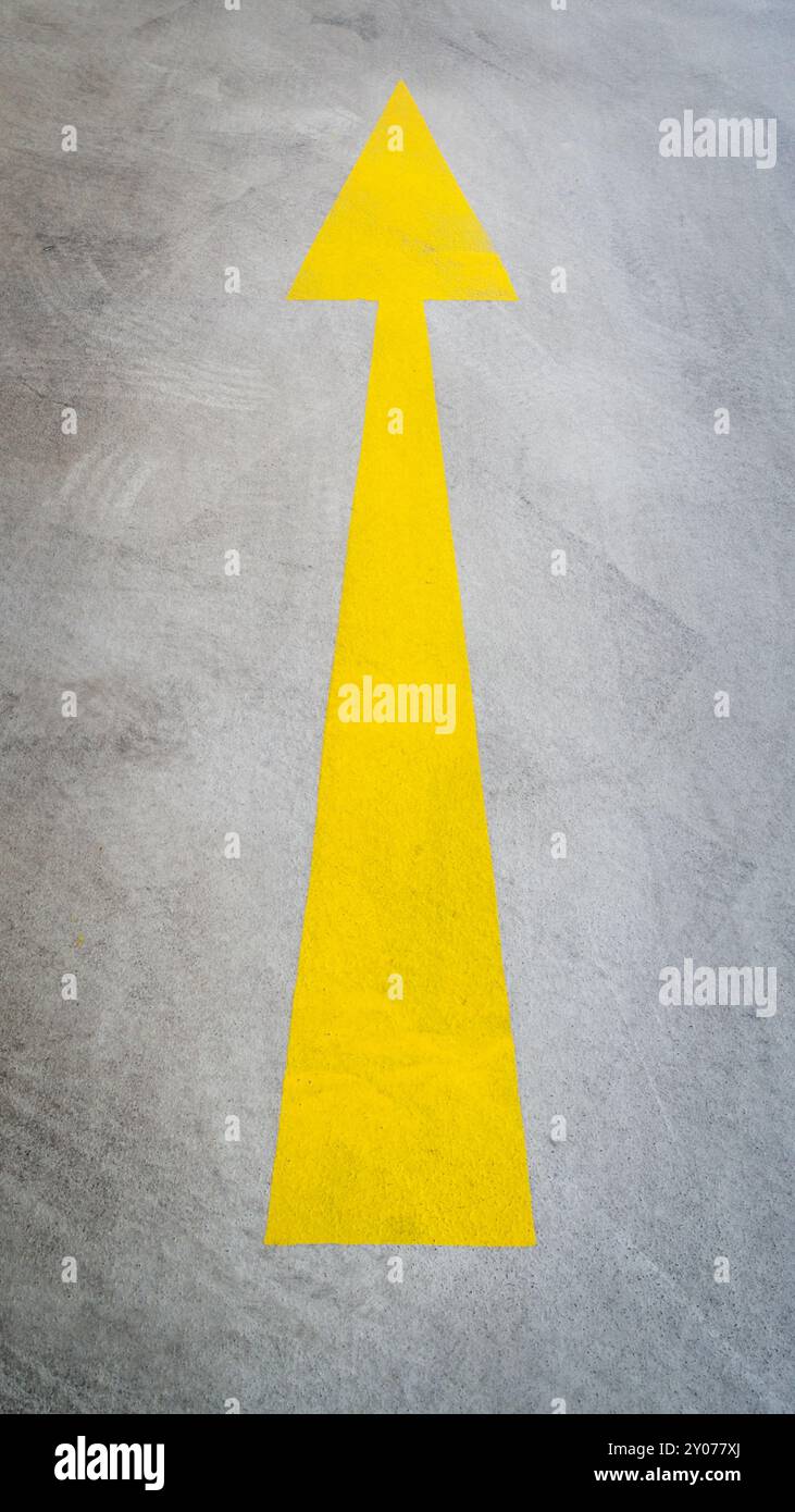 Arrow of a floor marking Stock Photo - Alamy