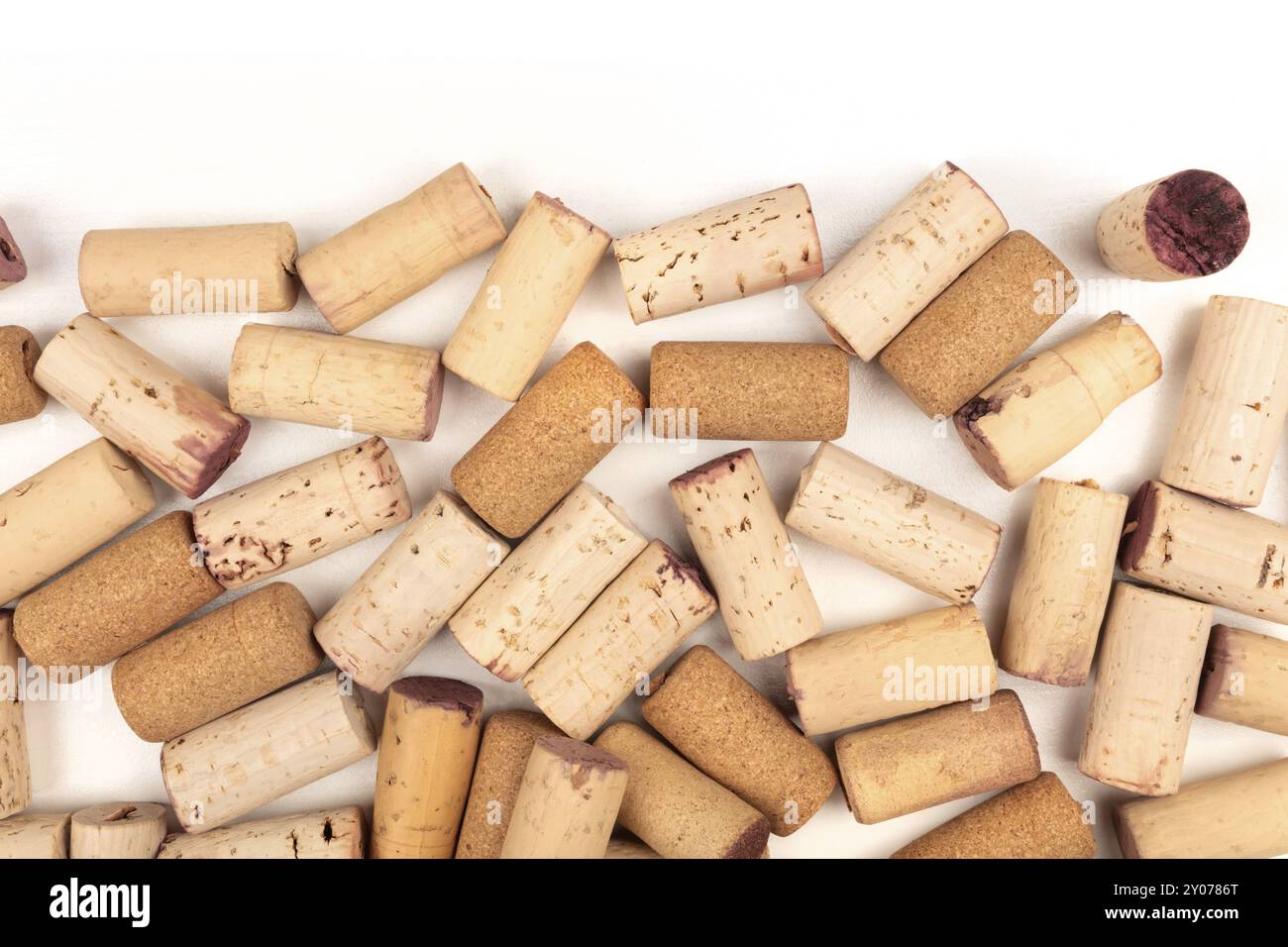 Many wine corks on a white background with a place for text. A design ...