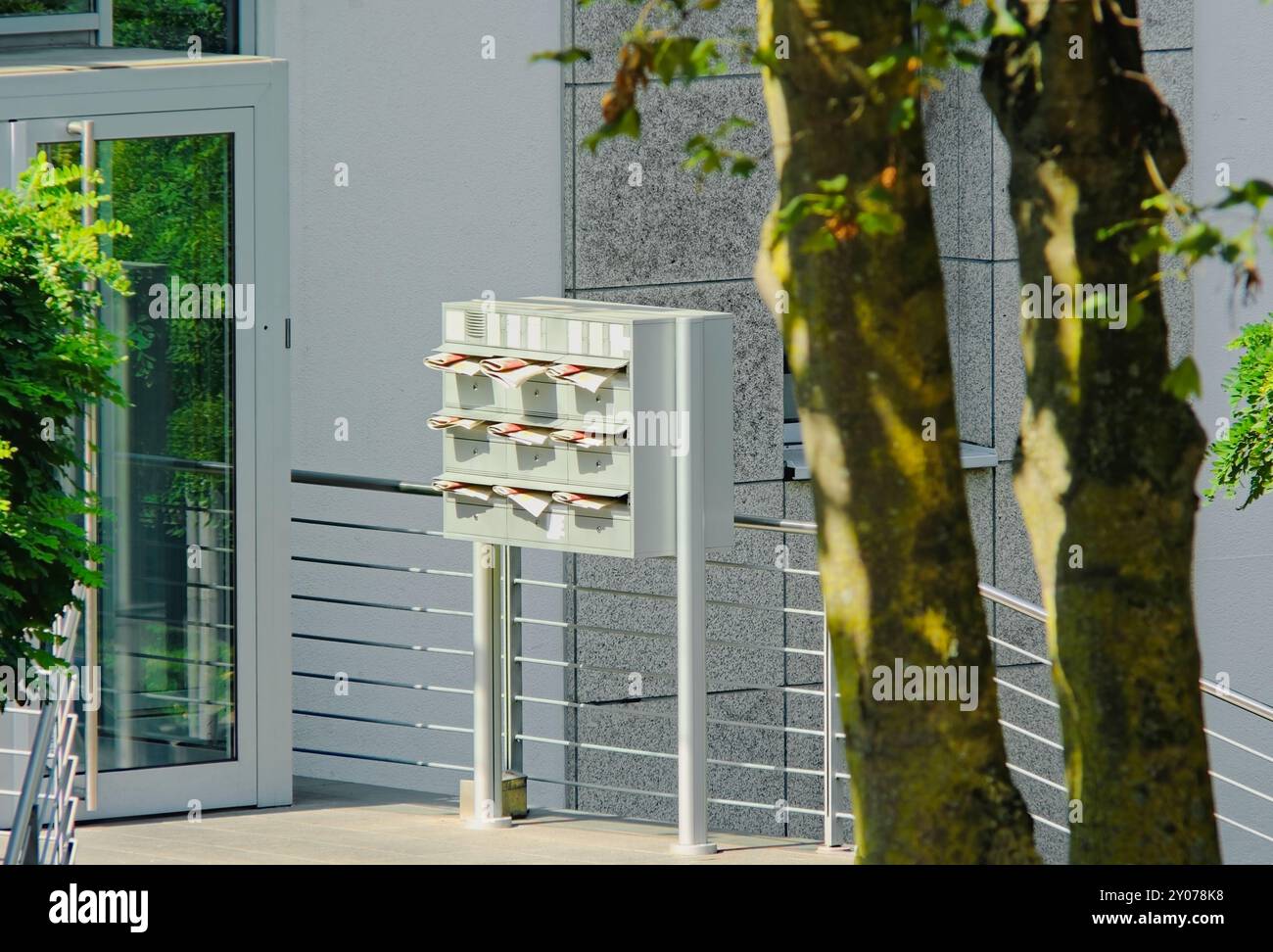 cluttered mailboxes,letterboxes brimed over with unauthorized ...
