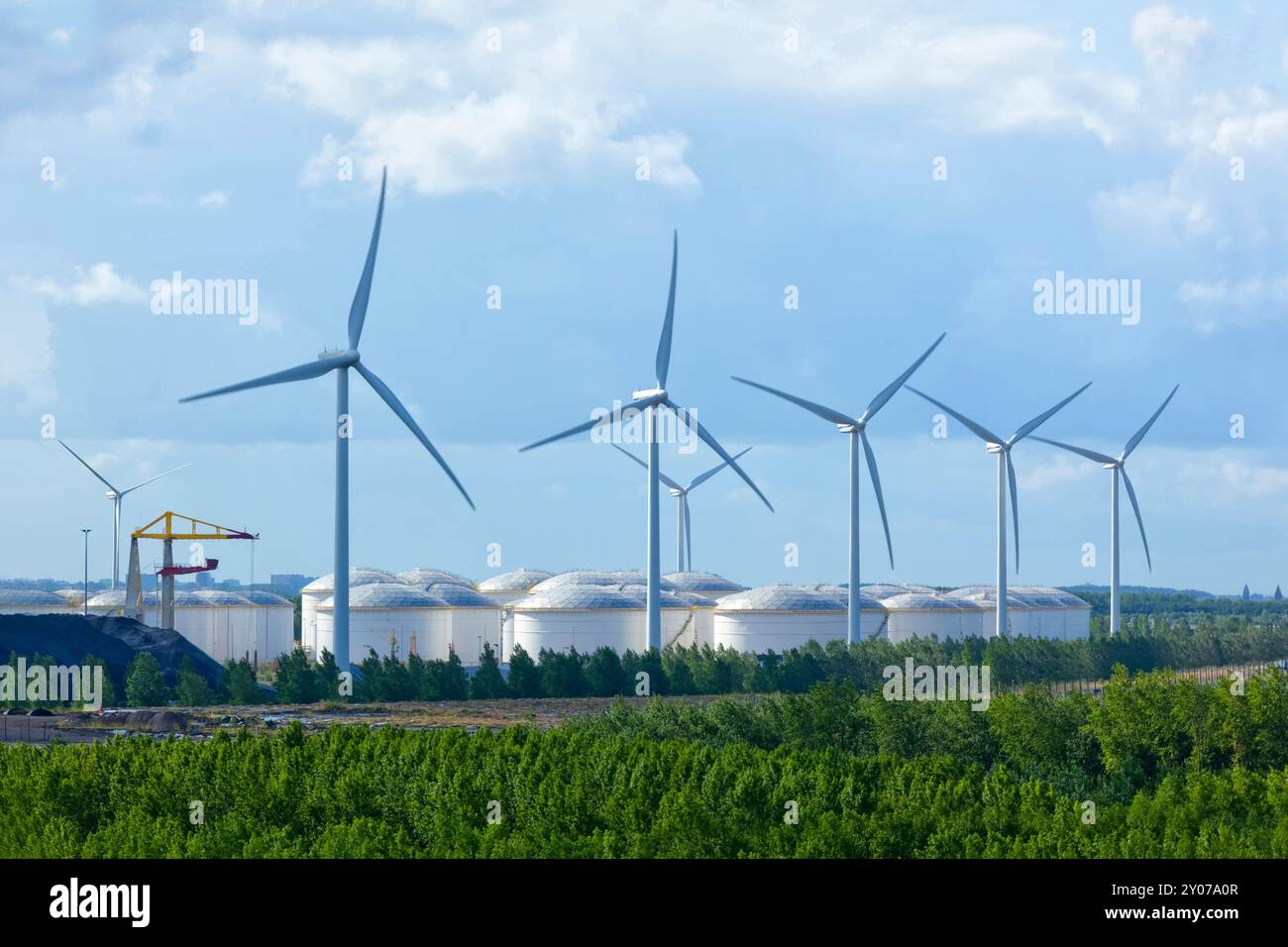Wind turbines in an industrial area Stock Photo - Alamy