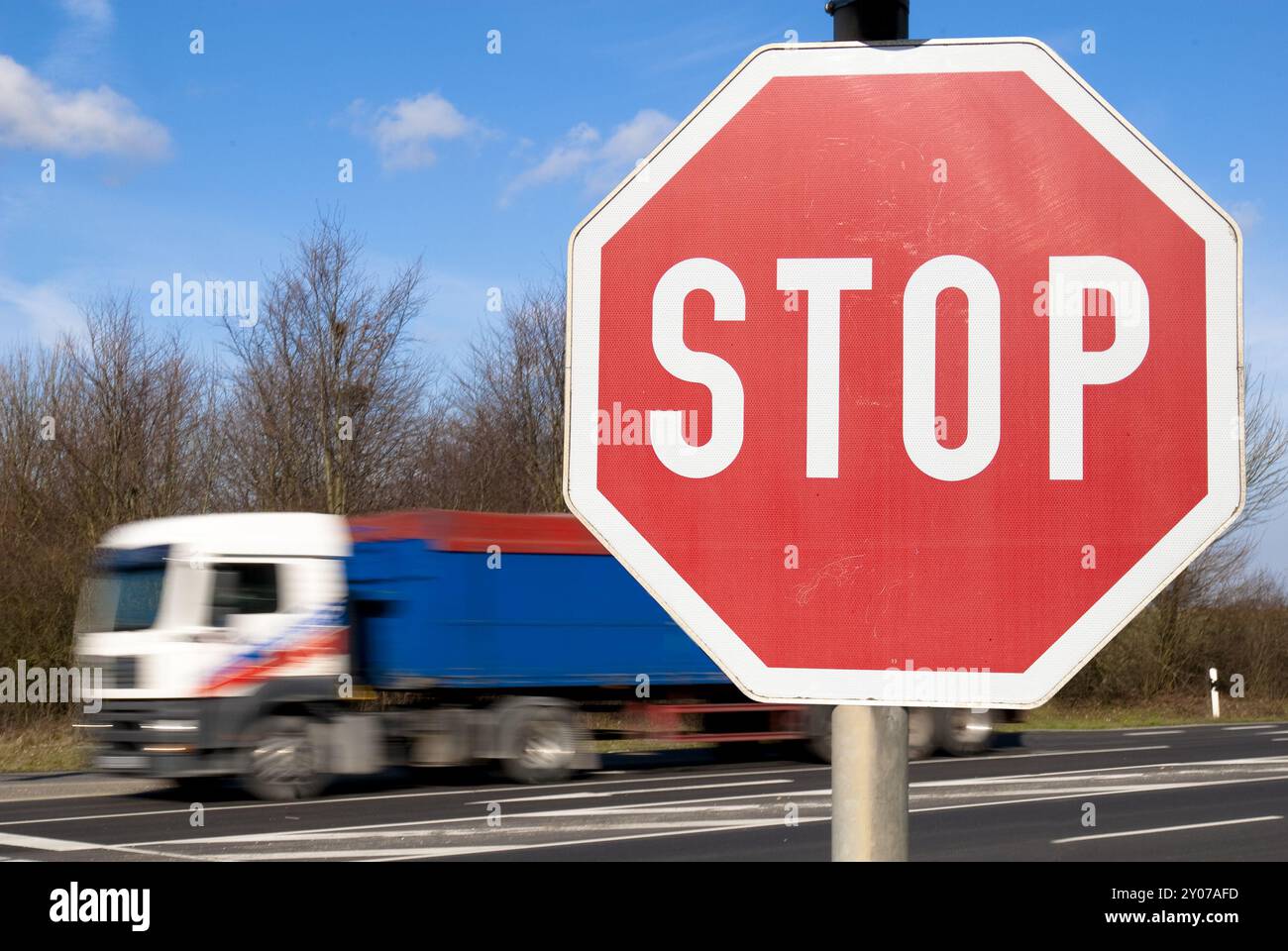 Stop sign and lorry Stock Photo - Alamy