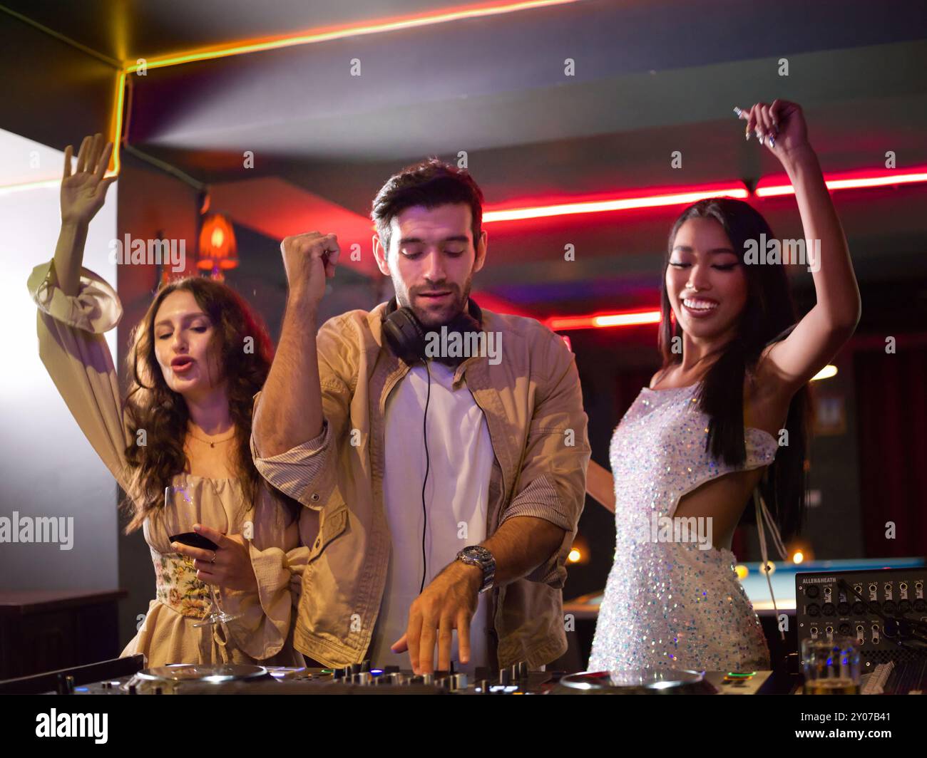 Male DJ playing music in club . Nightlife and disco concept Stock Photo ...
