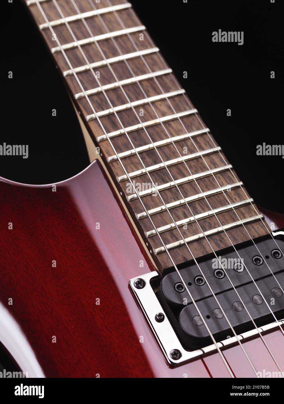Closeup of electric guitar neck, strings and humbucker pickup Stock ...