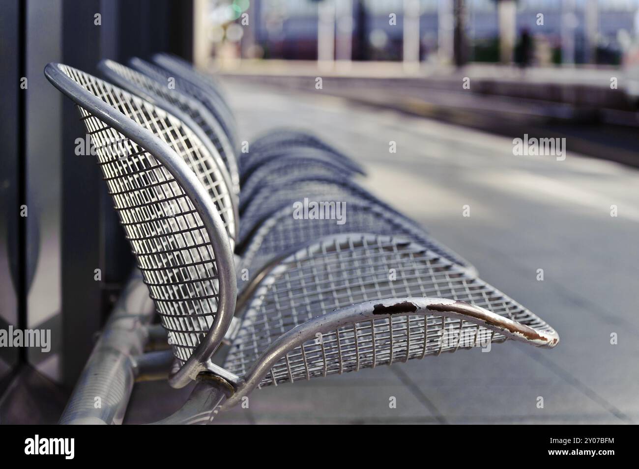 Row of seats at a bus stop Stock Photo - Alamy