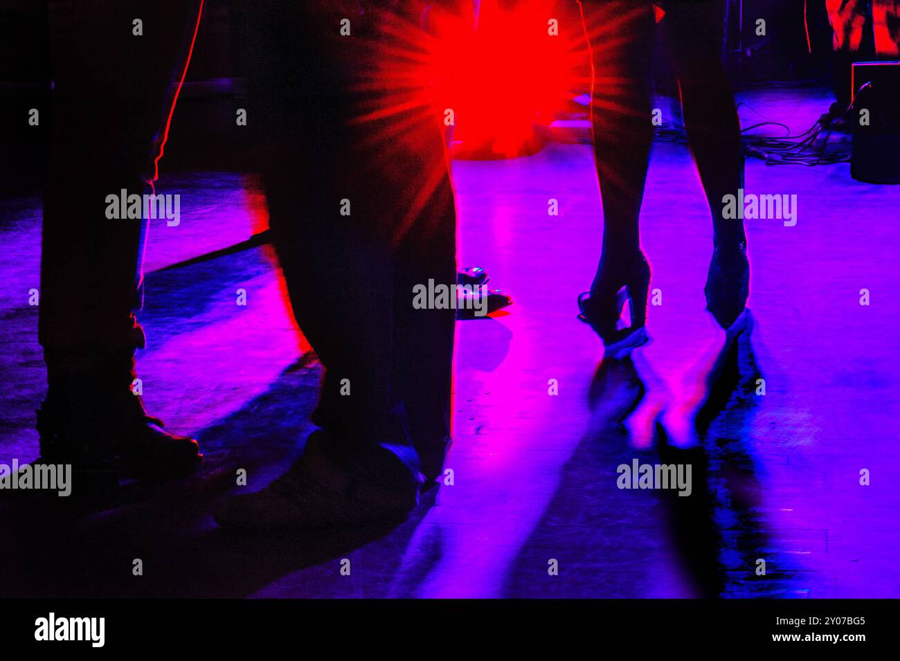 Red spotlight on dance floor hi-res stock photography and images - Alamy